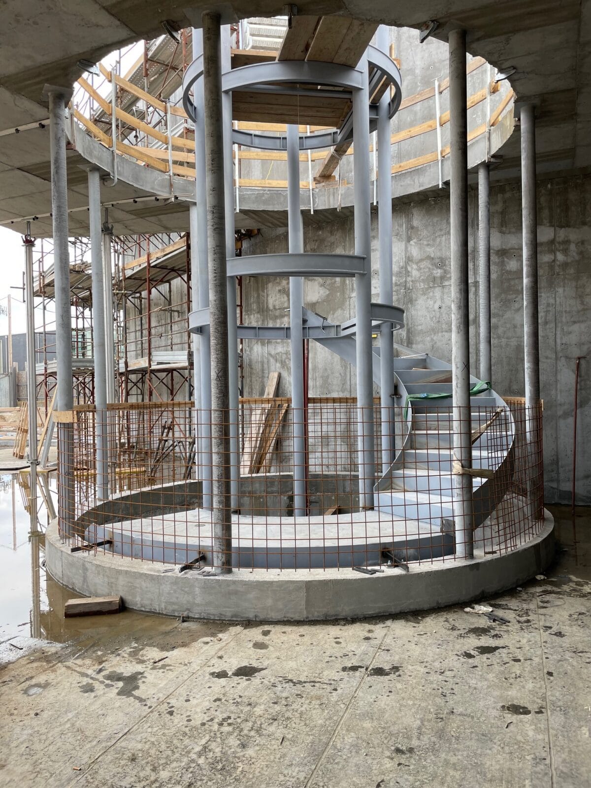 Cylindrical Elevator Shaft with Helical Staircase - Ferrari e Associati
